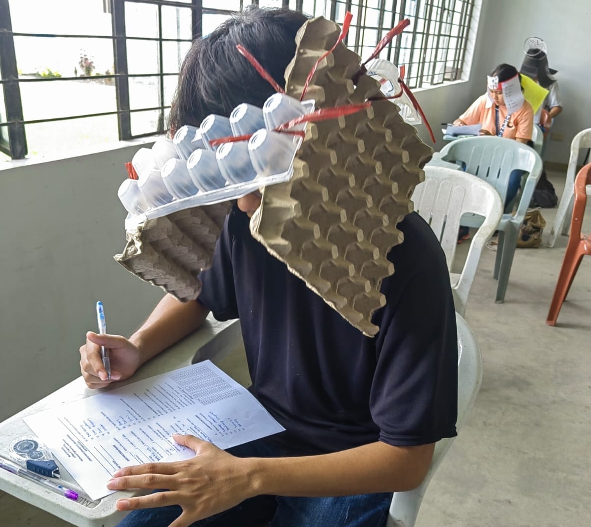 Photos of Philippine students wearing ‘anti-cheating hats’ go viral ...