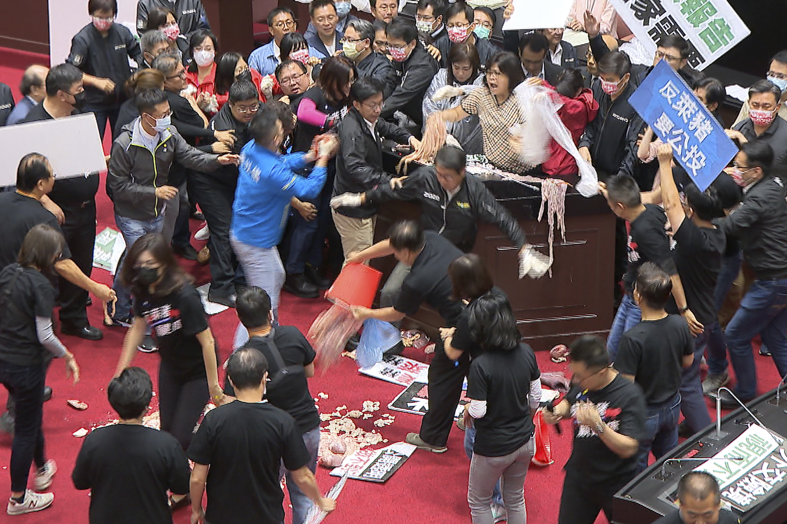 Legislators threw pig guts in Taiwan’s parliament. Here’s what you need ...